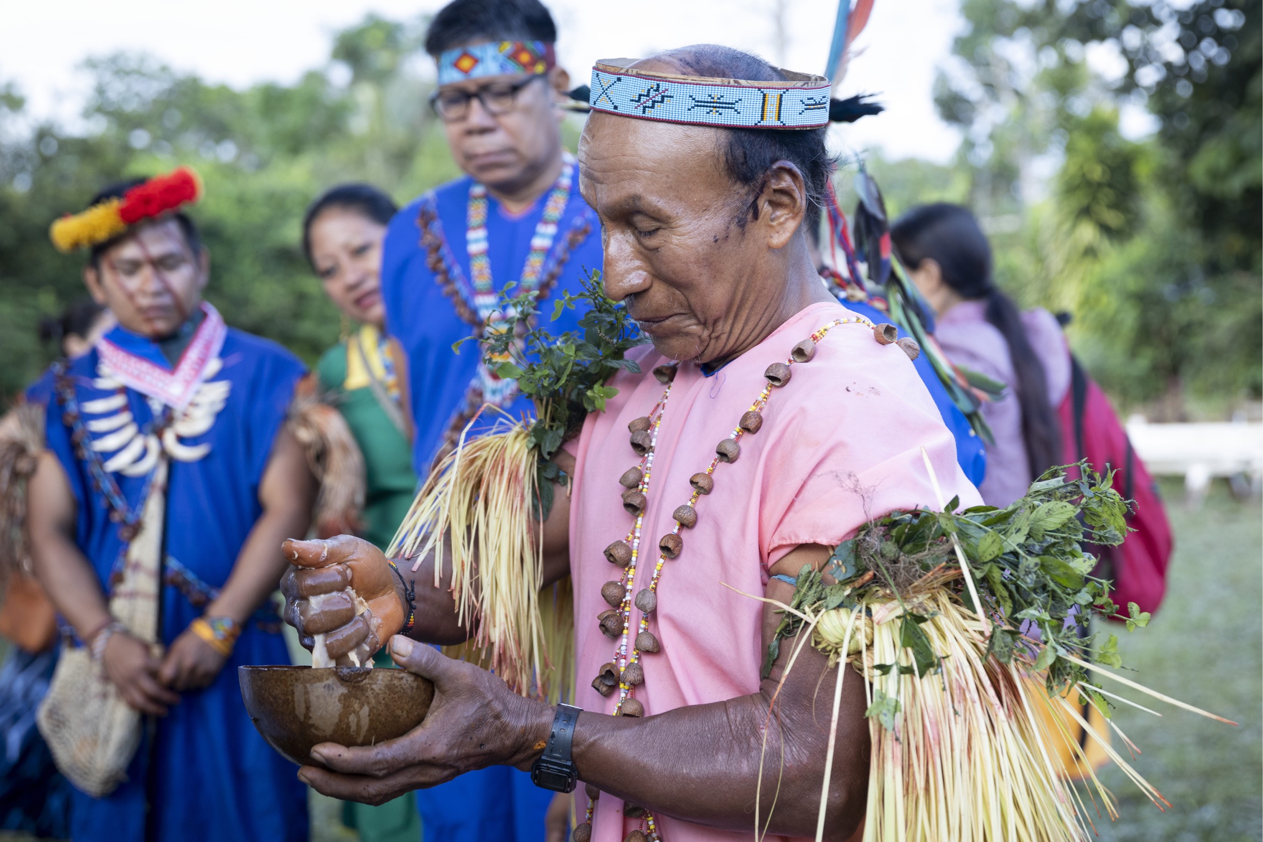 Elders perform a spiritual cleansing of the hearing space and offered ...